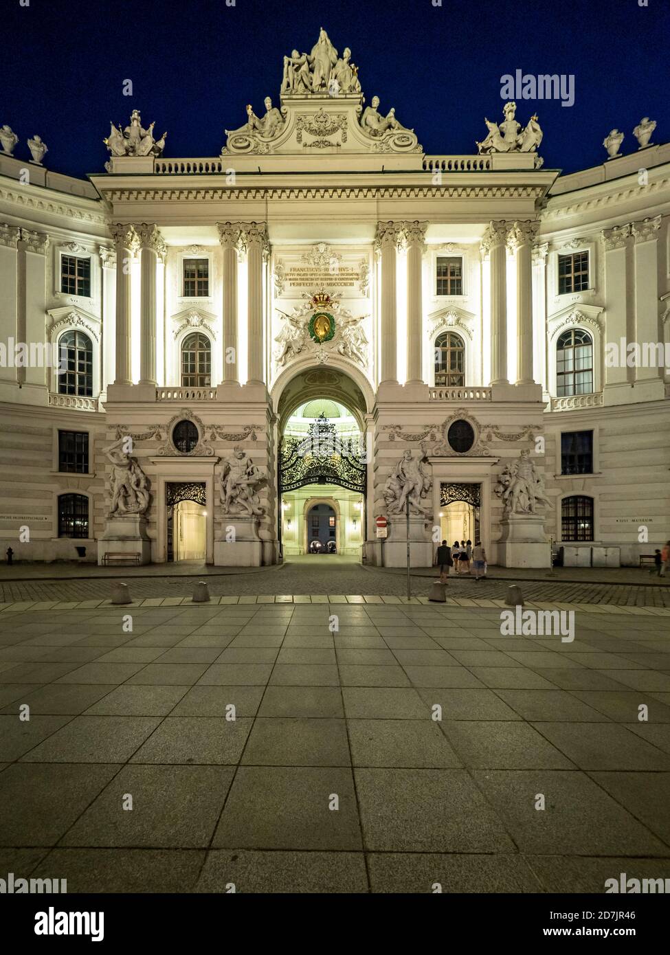 Austria, Vienna, Entrance gates of Hofburg palace at night Stock Photo ...
