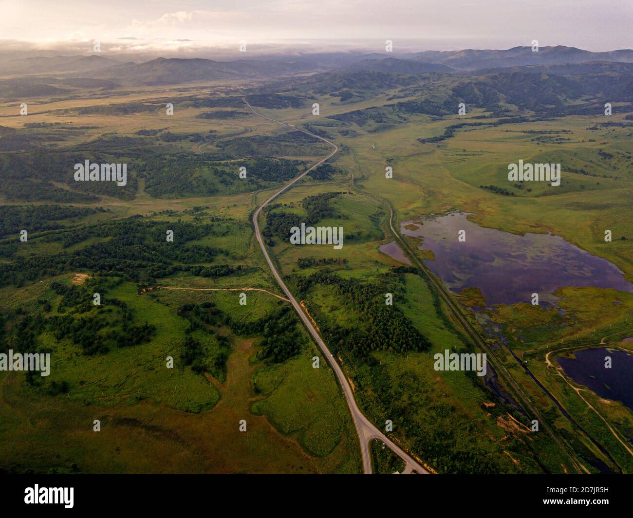 Russia, Primorsky Krai, Zarubino, Aerial view of road stretching along ...