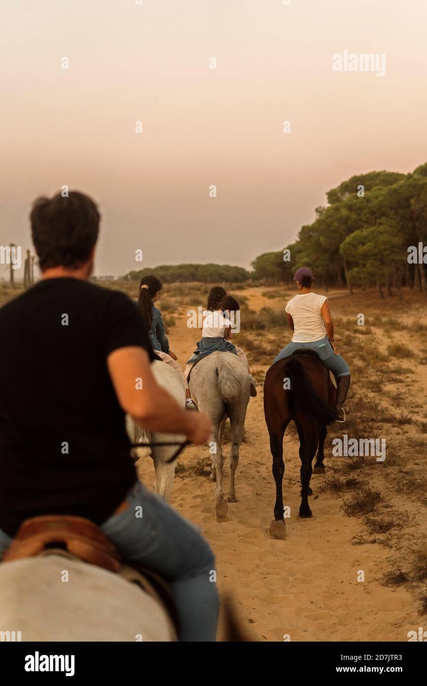 Riding horses at sunset hi-res stock photography and images - Alamy