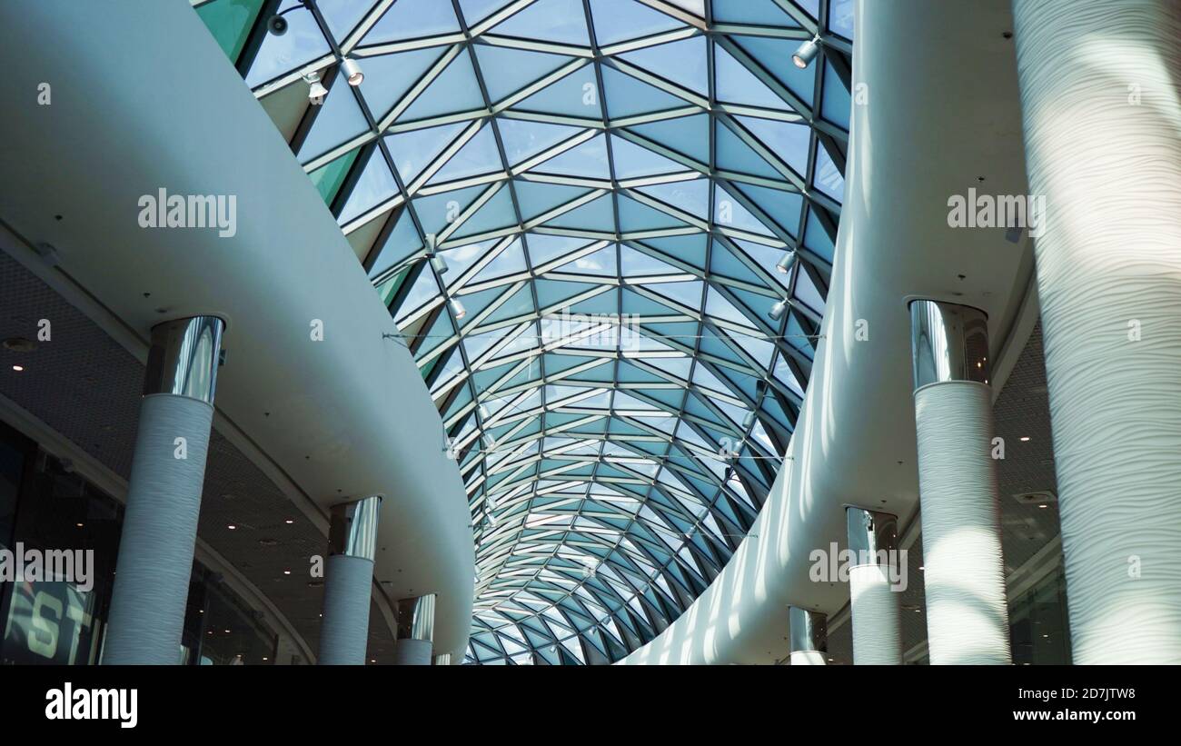 Modern design of the glass roof of the shopping center, inside view ...