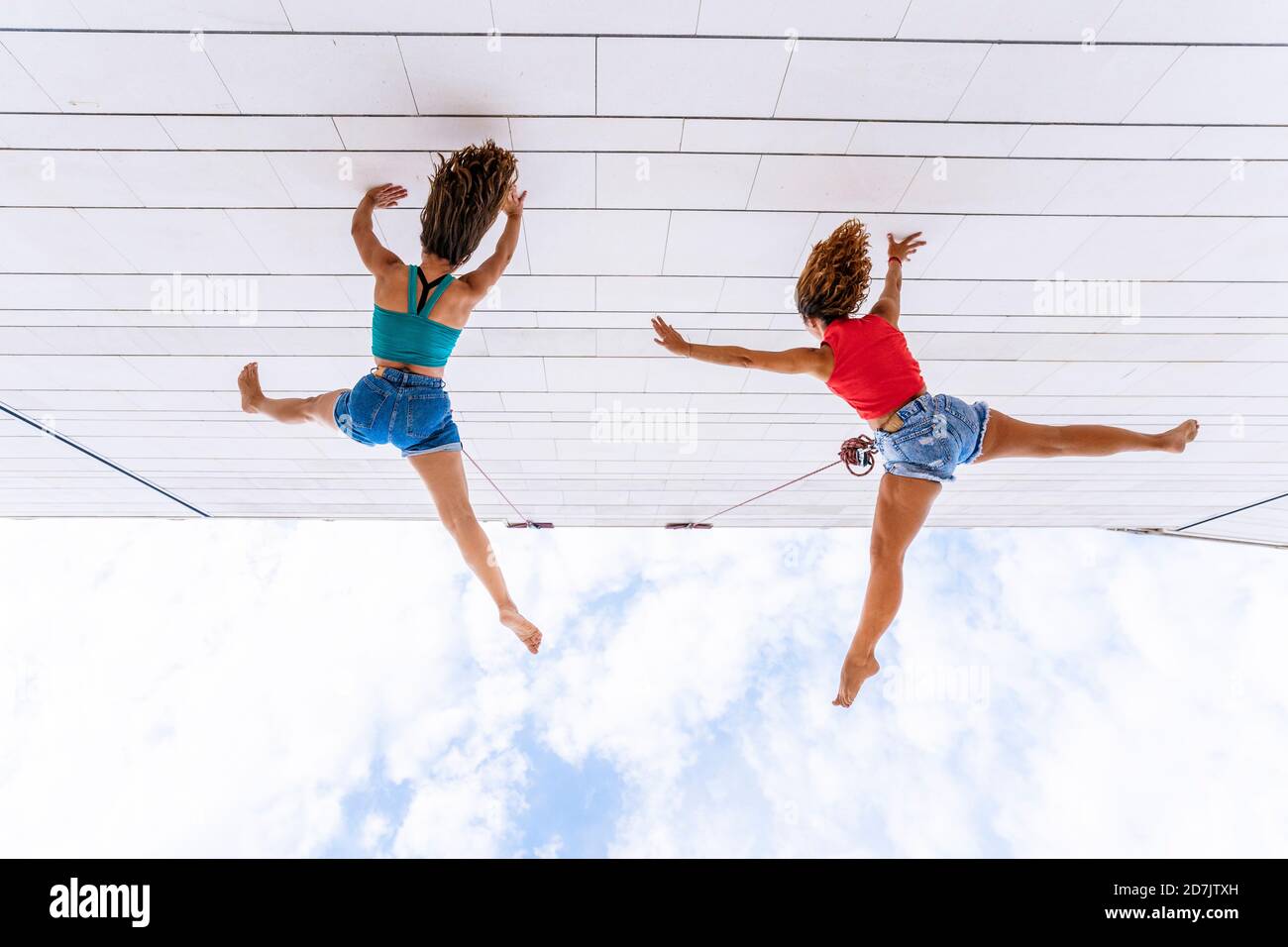 Dancers dancing on window Stock Photo - Alamy
