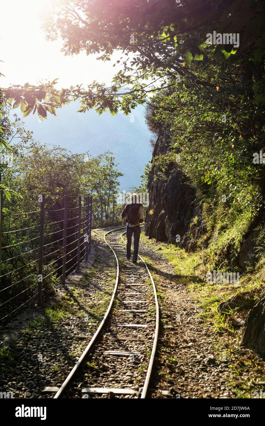 Man walking on rail track hi-res stock photography and images - Alamy