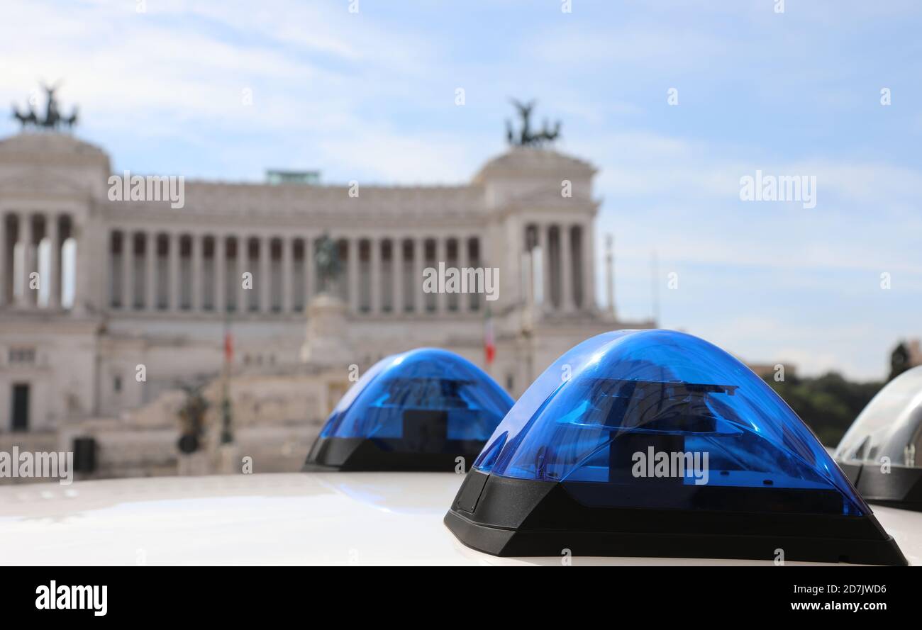 blue sirens of police car and the ancient italian palace in ROME called ...