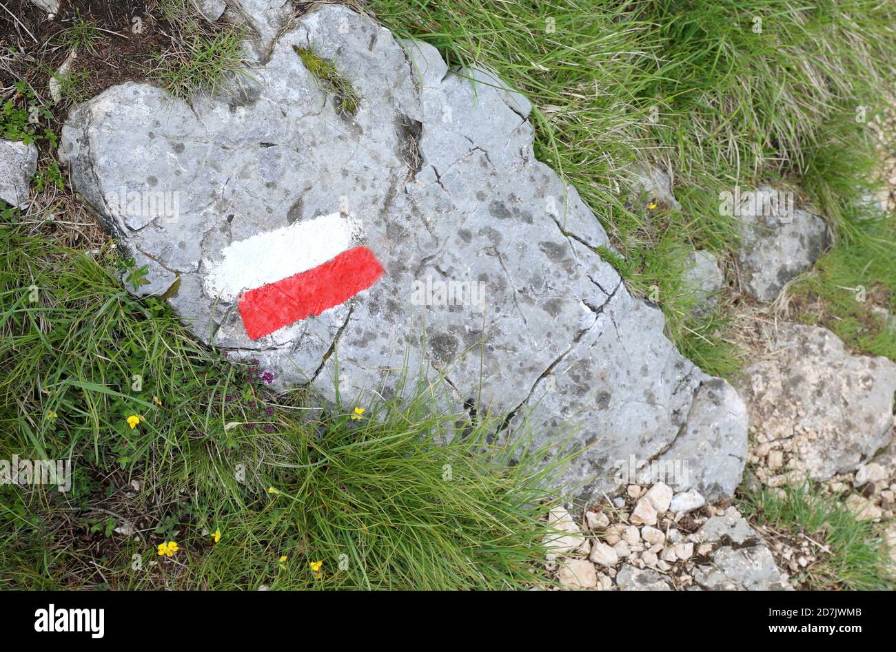 mountain track on the path with red and white colors Stock Photo - Alamy