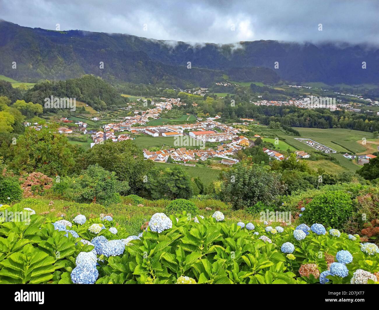 Meadow or plain and townscape of a small village surrounded by ...