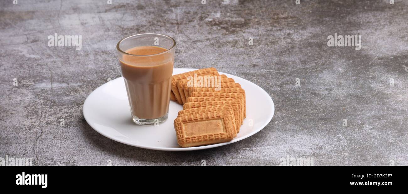 Cutting Chai, Traditional Desi Roadside tea of india with biscuits ...