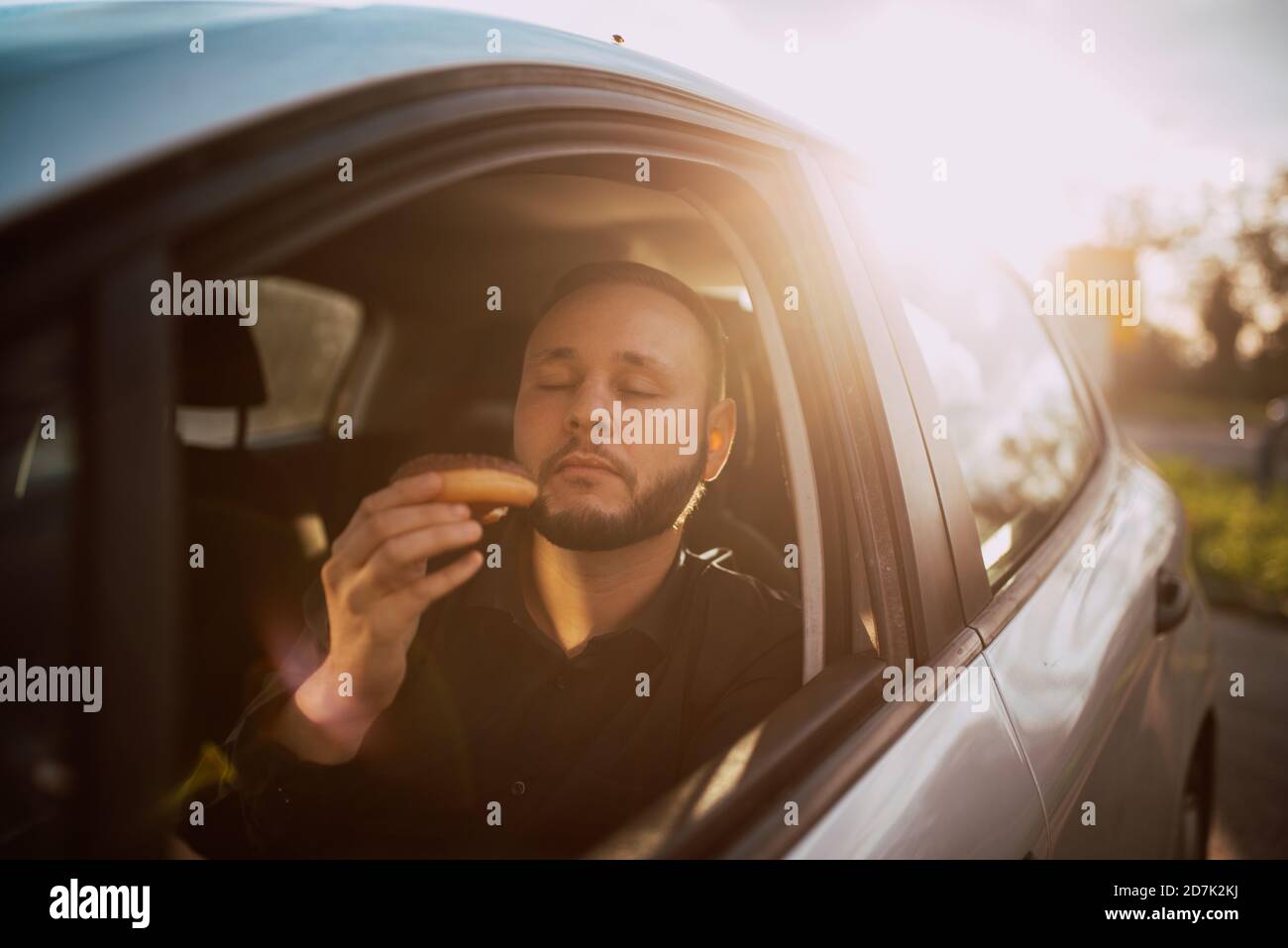 Squinting driving hi-res stock photography and images - Alamy