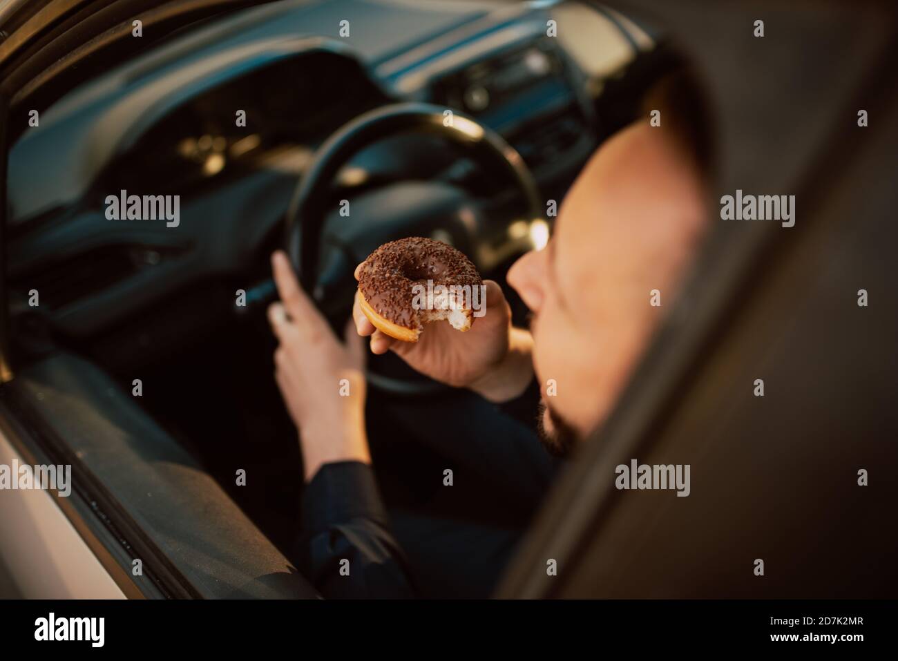 Happy fat man eating chocolate hi-res stock photography and images - Alamy