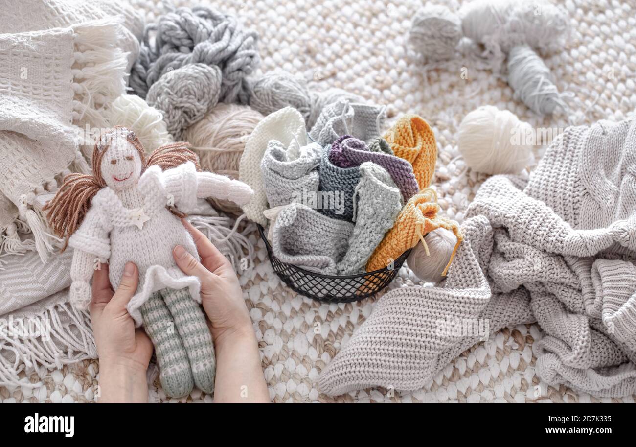 Handmade knitted toys with balls of thread . Concept of Hobbies and ...