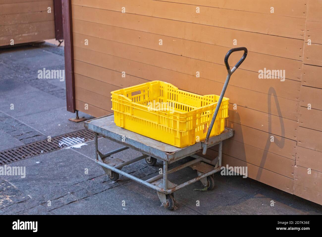 Yellow Plastic Crate at Cart Dolly Transport Stock Photo - Alamy