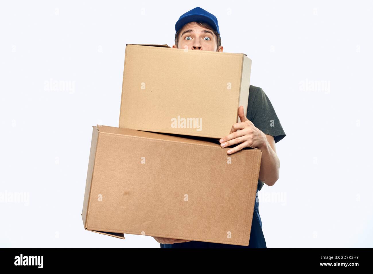 Working man with boxes in hands delivery service work lifestyle Stock ...