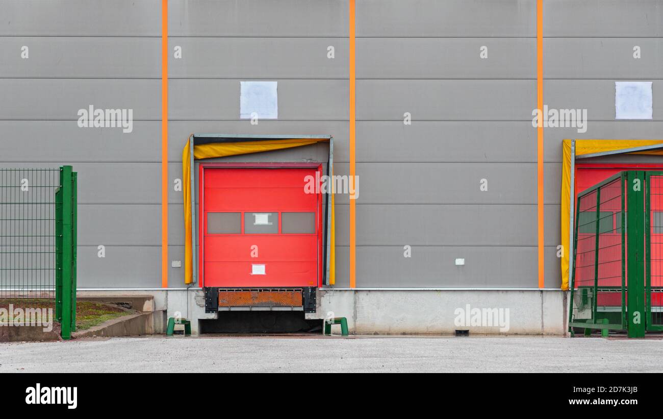 Loading Cargo Dock Doors at Distribution Warehouse Stock Photo - Alamy