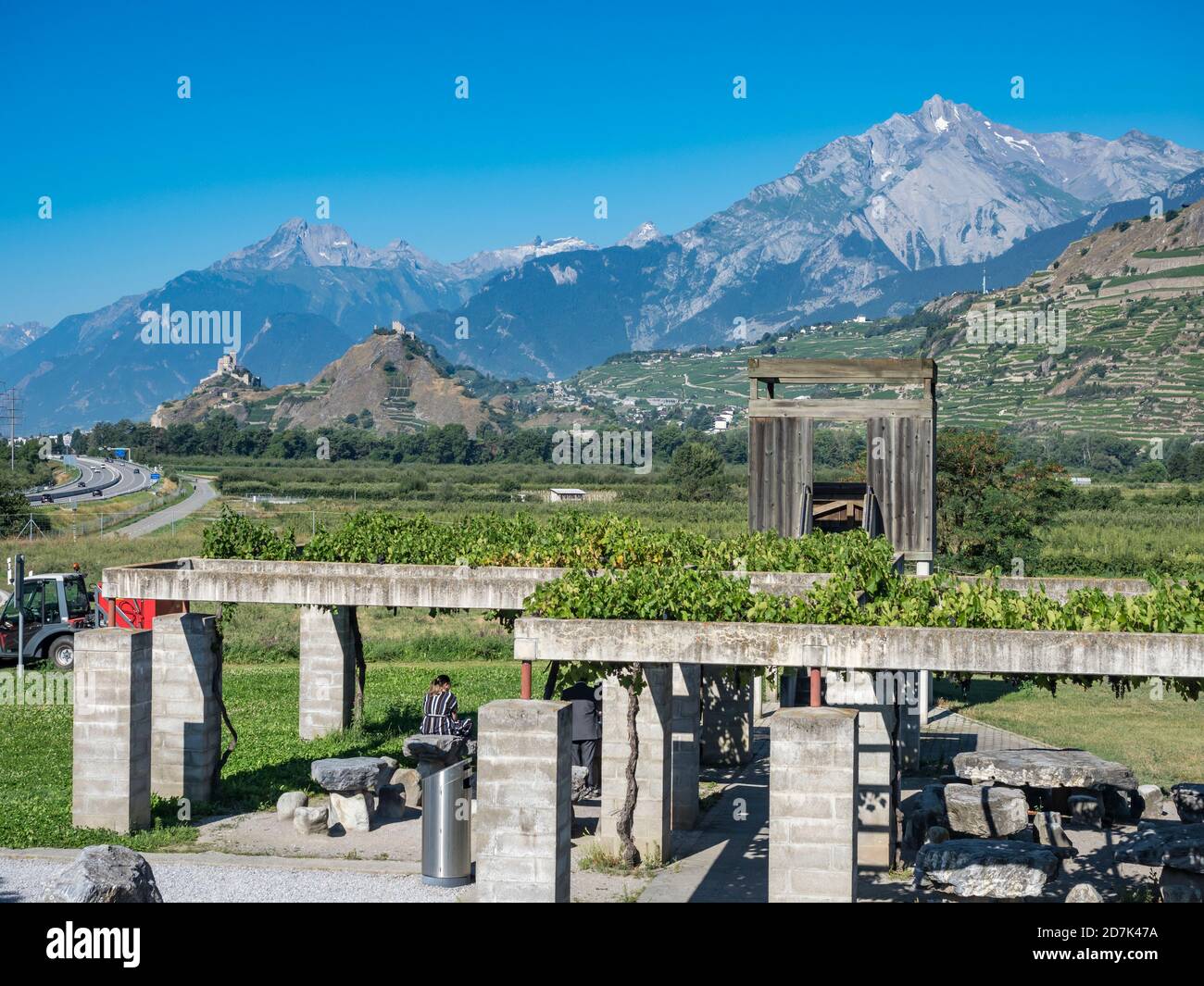 View over vineyards to castles of Sierre and Sion in the Rhone valley ...
