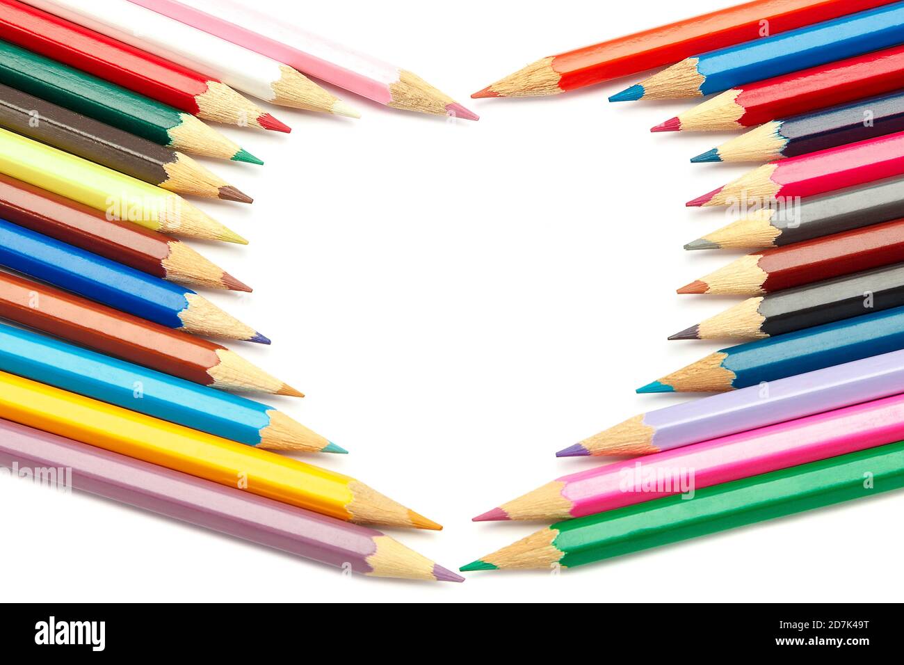Heart of colored pencils on white background Stock Photo - Alamy
