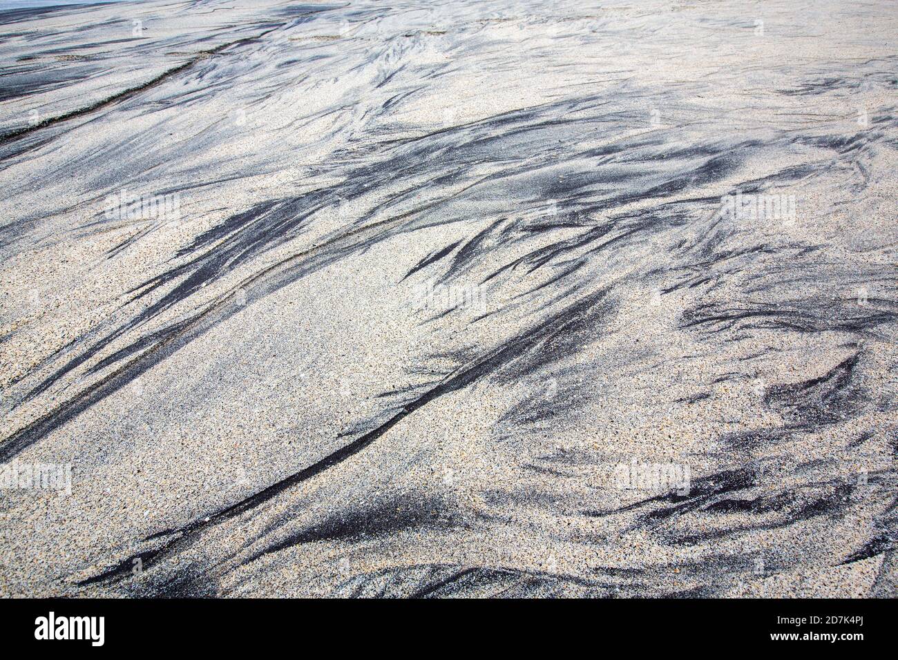 Patterns in the sand on Portheras Cove beach, Cornwall, UK Stock Photo ...