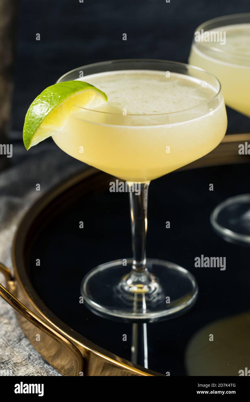 Refreshing Boozy Gin Gimlet Cocktail with a Lime Garnish Stock Photo ...