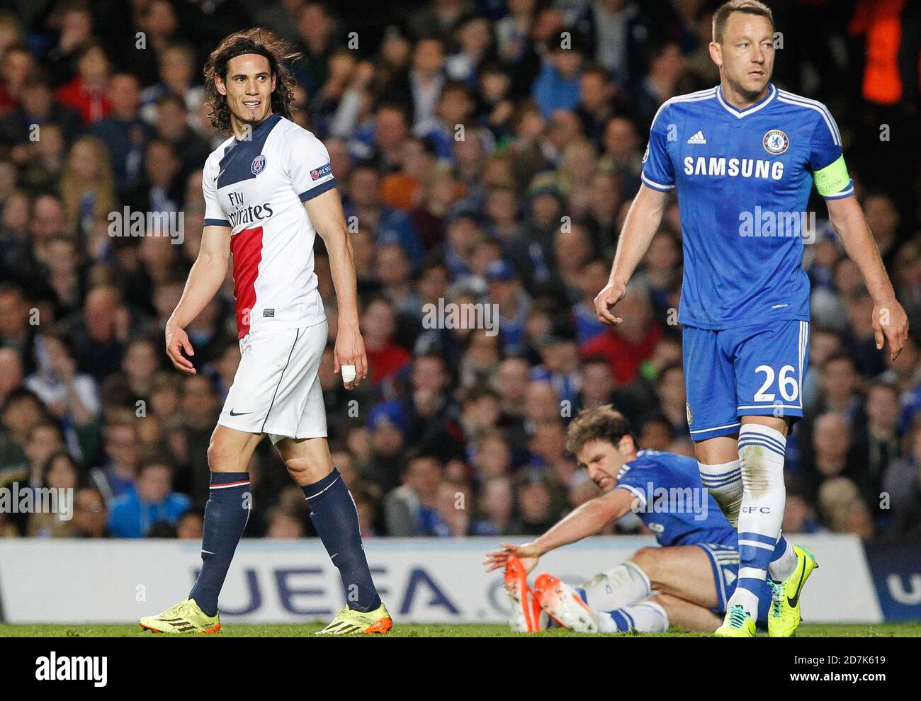 Edison Cavani of Paris Saint Germain and John Terry of FC Chelsea ...