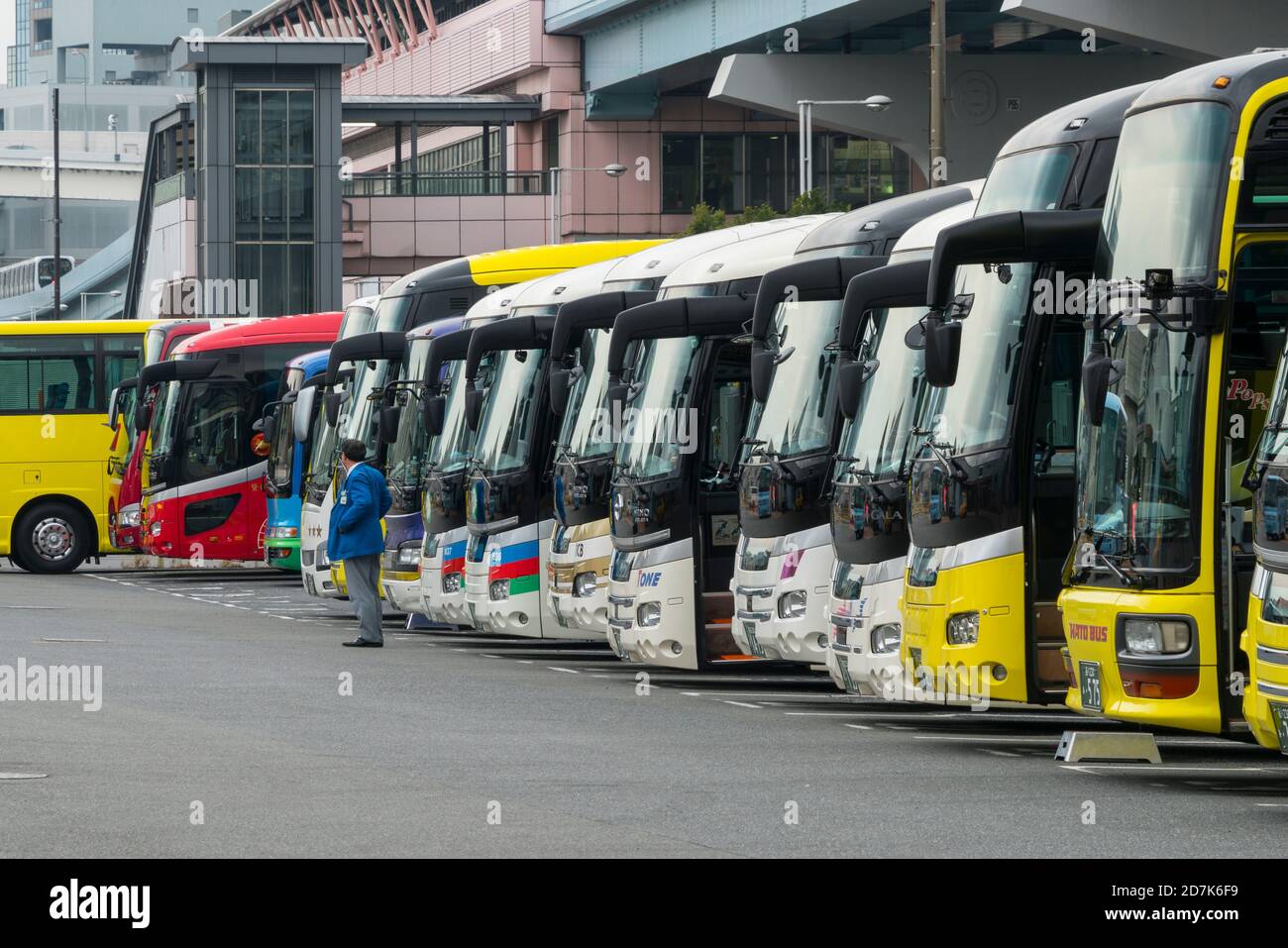 Many sightseeing tour buses park on the Hinode Pier at Tokyo Japan ...