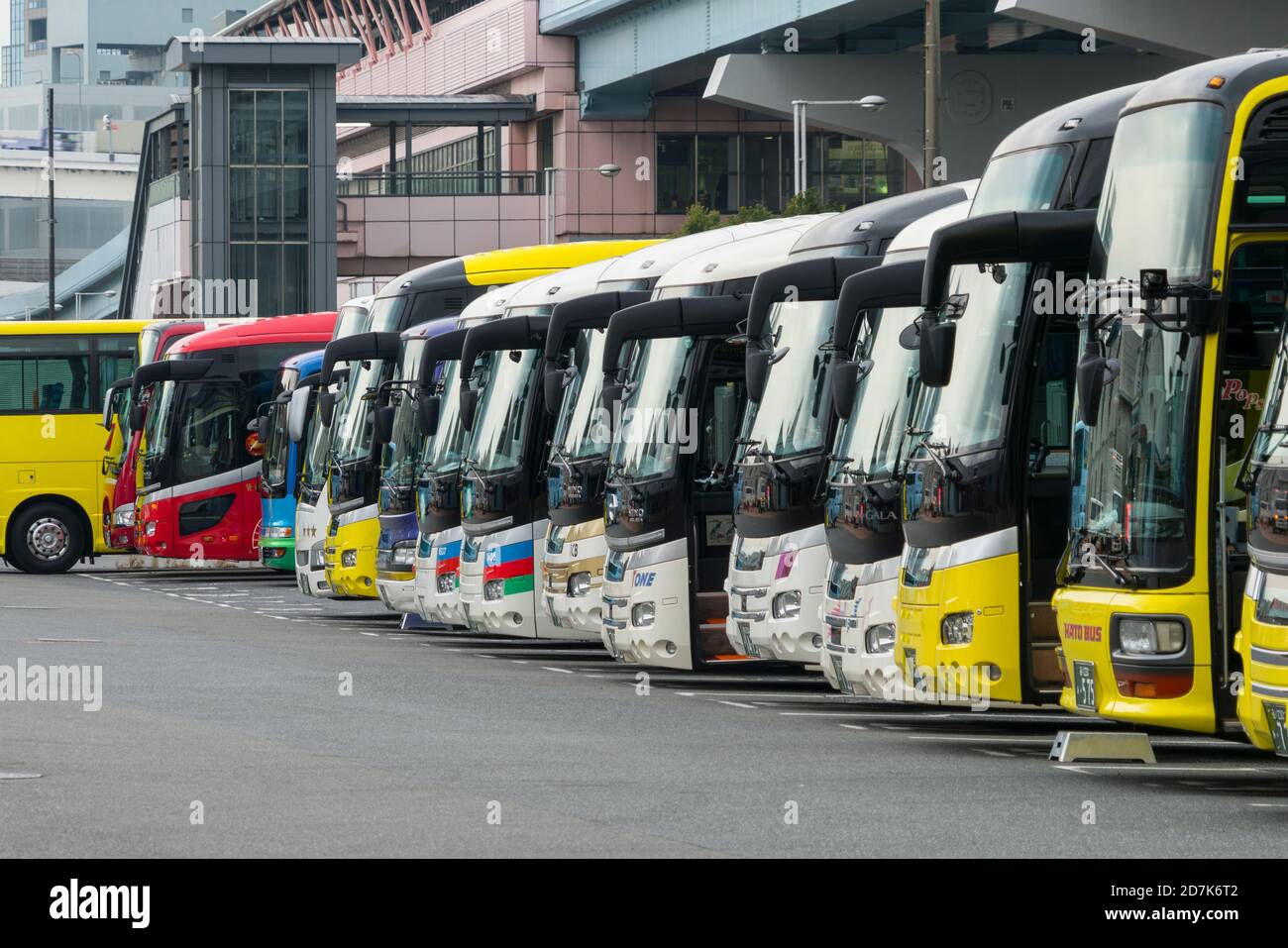 Many sightseeing tour buses park on the Hinode Pier at Tokyo Japan ...