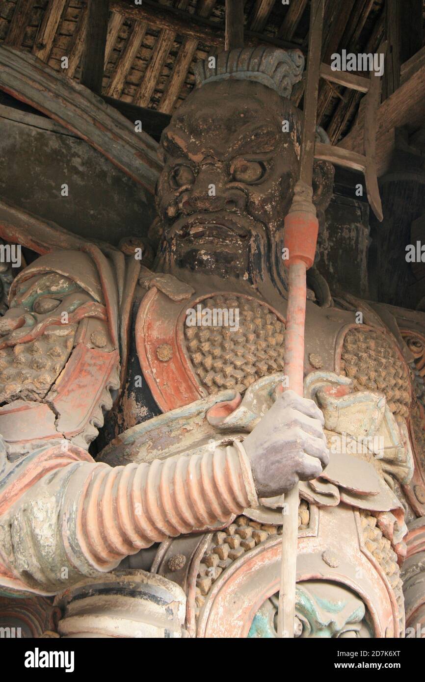 statue of a guardian in a taoist temple (qing xu guan) in pingyao ...