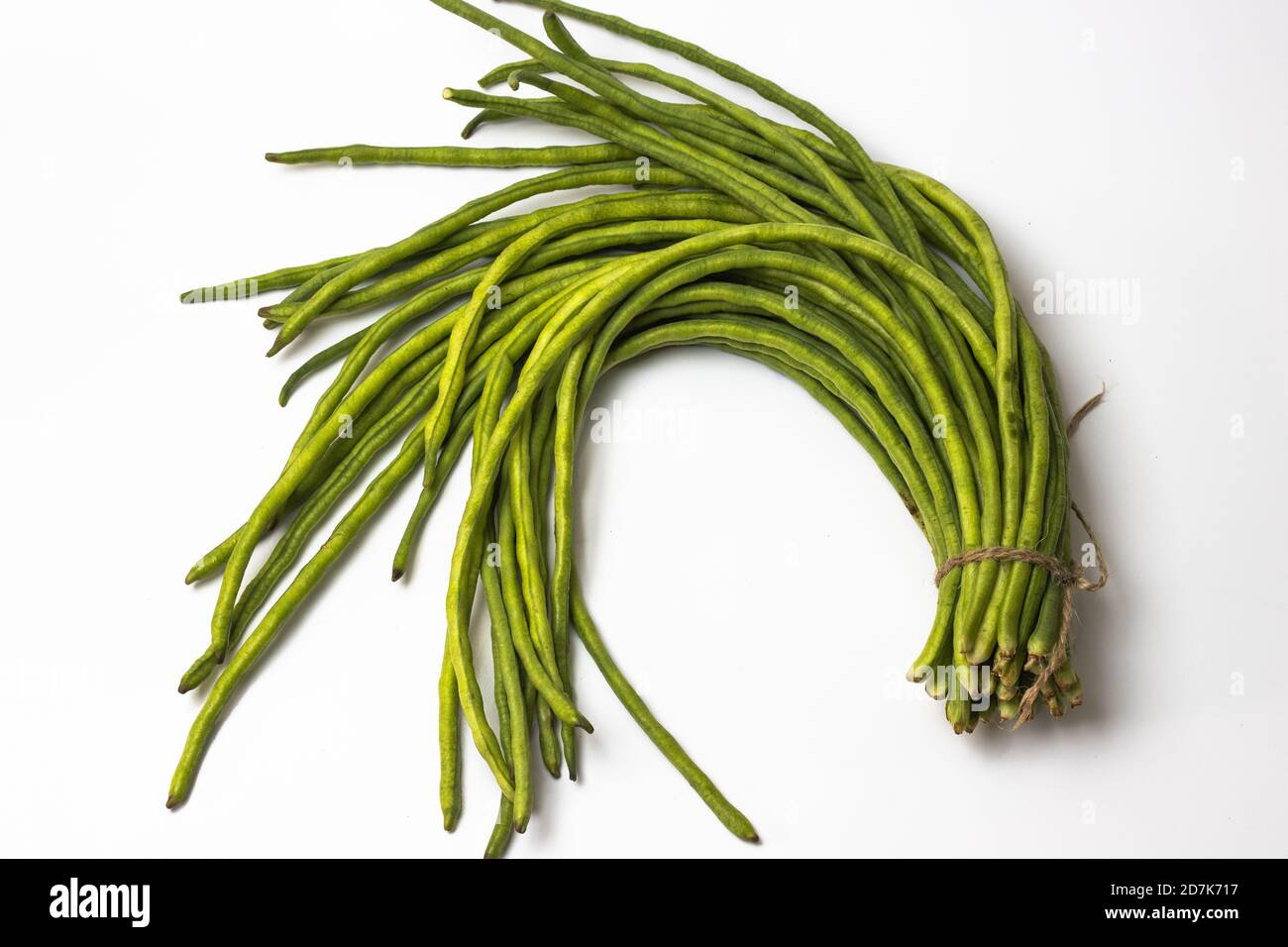 Healthy long cowpea on white background Stock Photo - Alamy