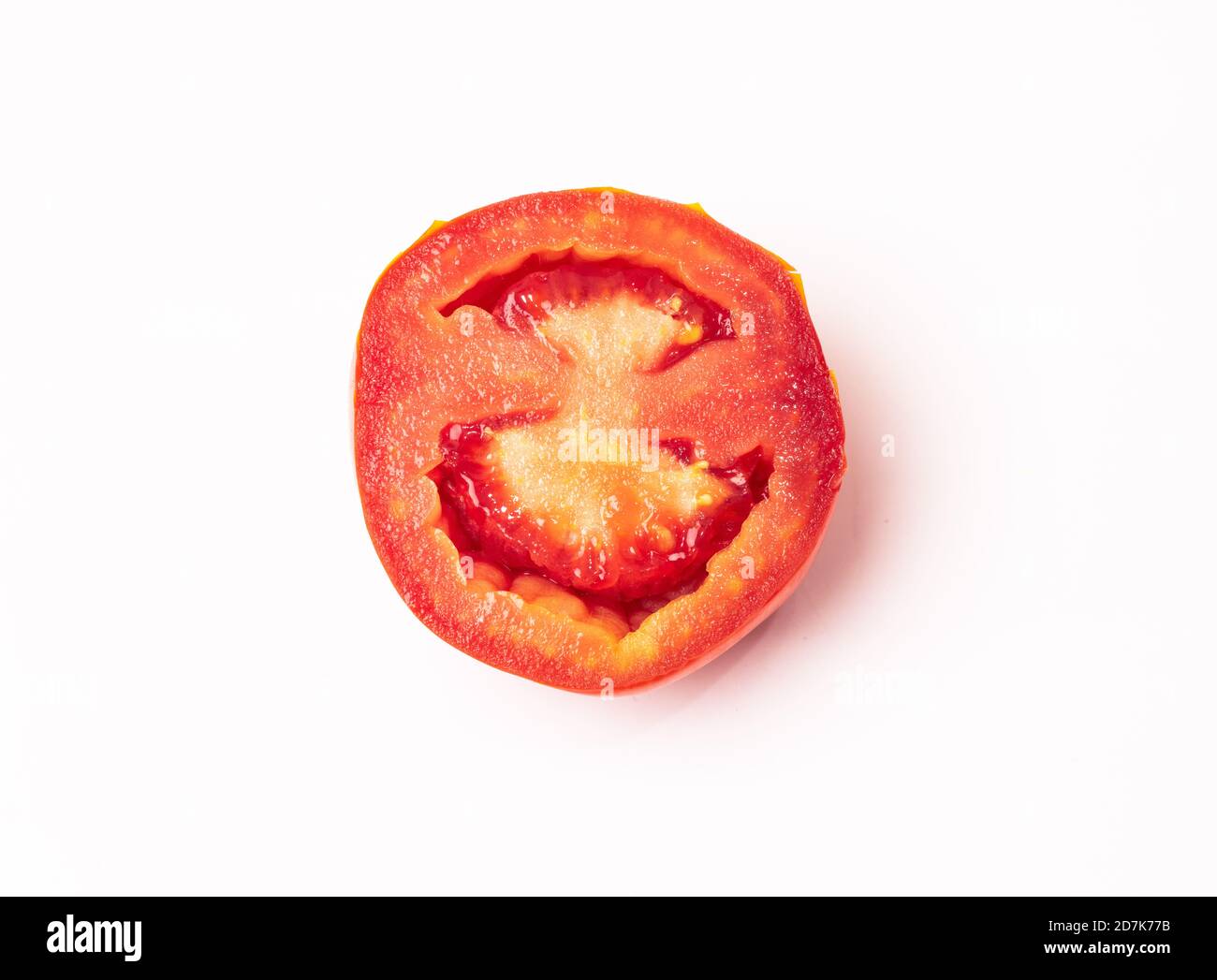 Red delicious tomato slice Stock Photo - Alamy