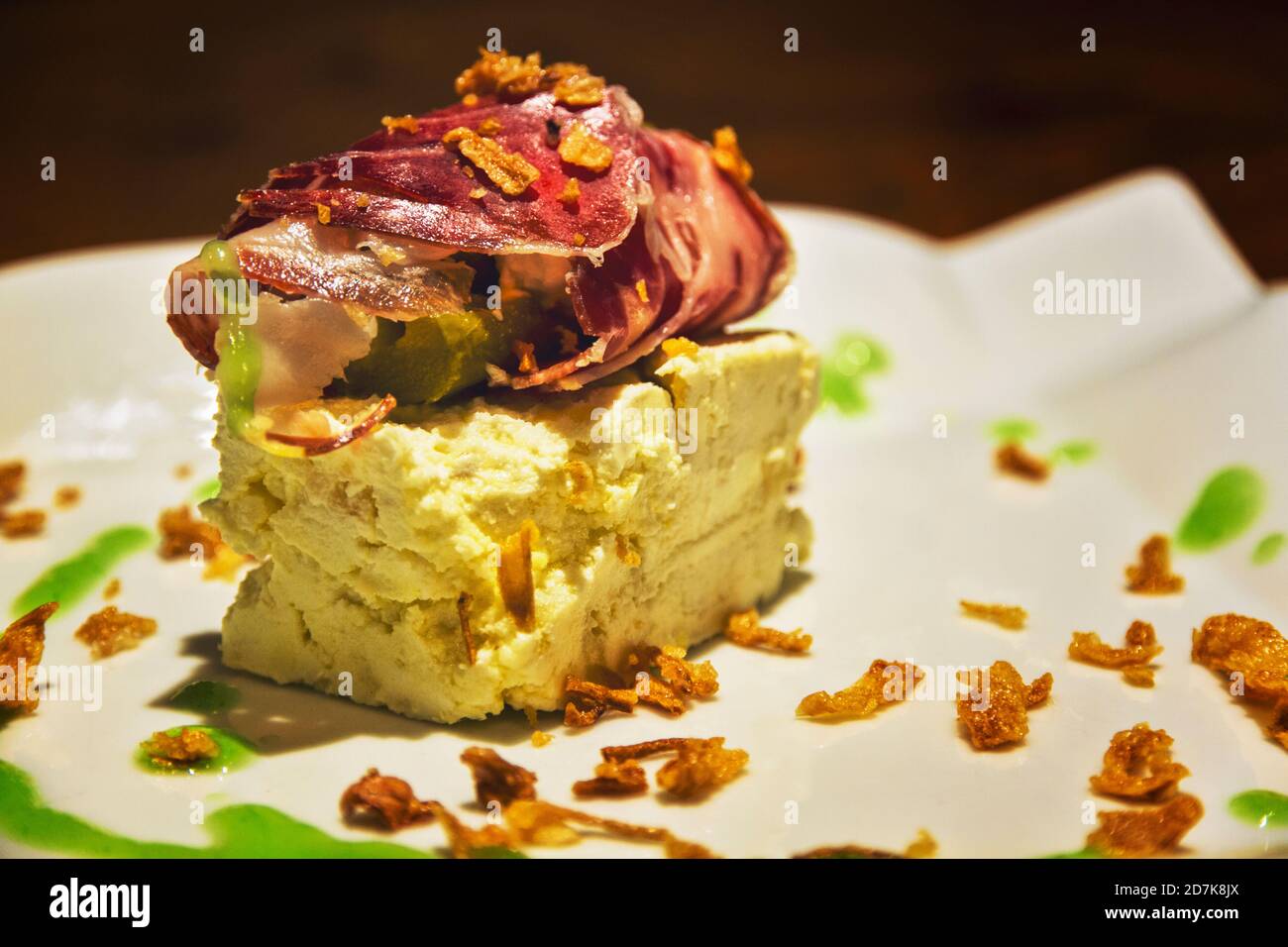 Detail of bar food skewer on wooden table with ham Stock Photo - Alamy