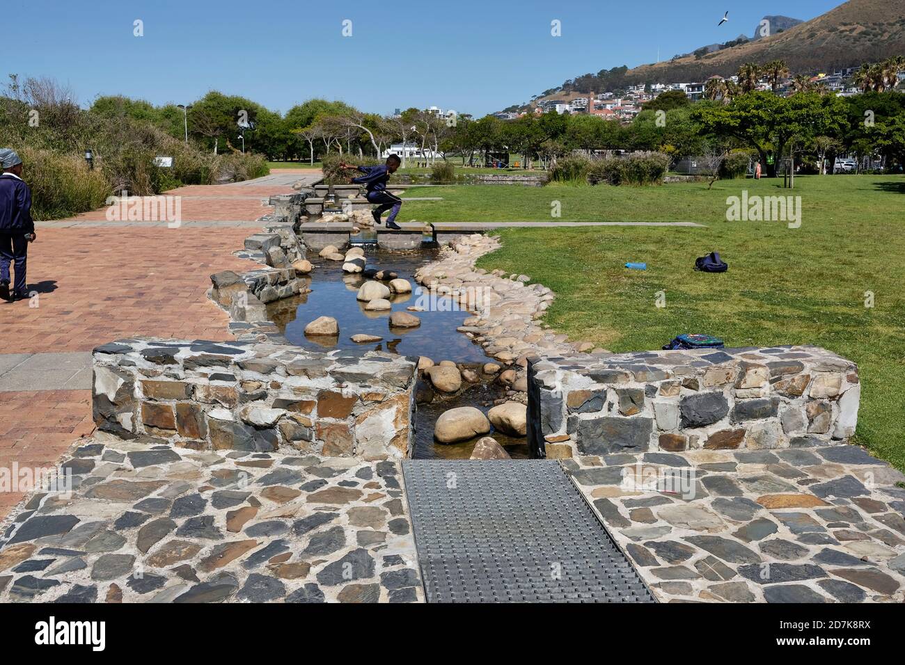 Jumping Over A Stream Of Water High Resolution Stock Photography and ...