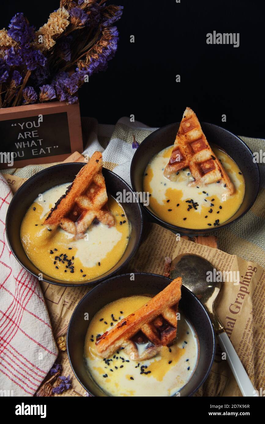 Waffle dips in soup serving by the slogan You Are What You Eat Stock ...