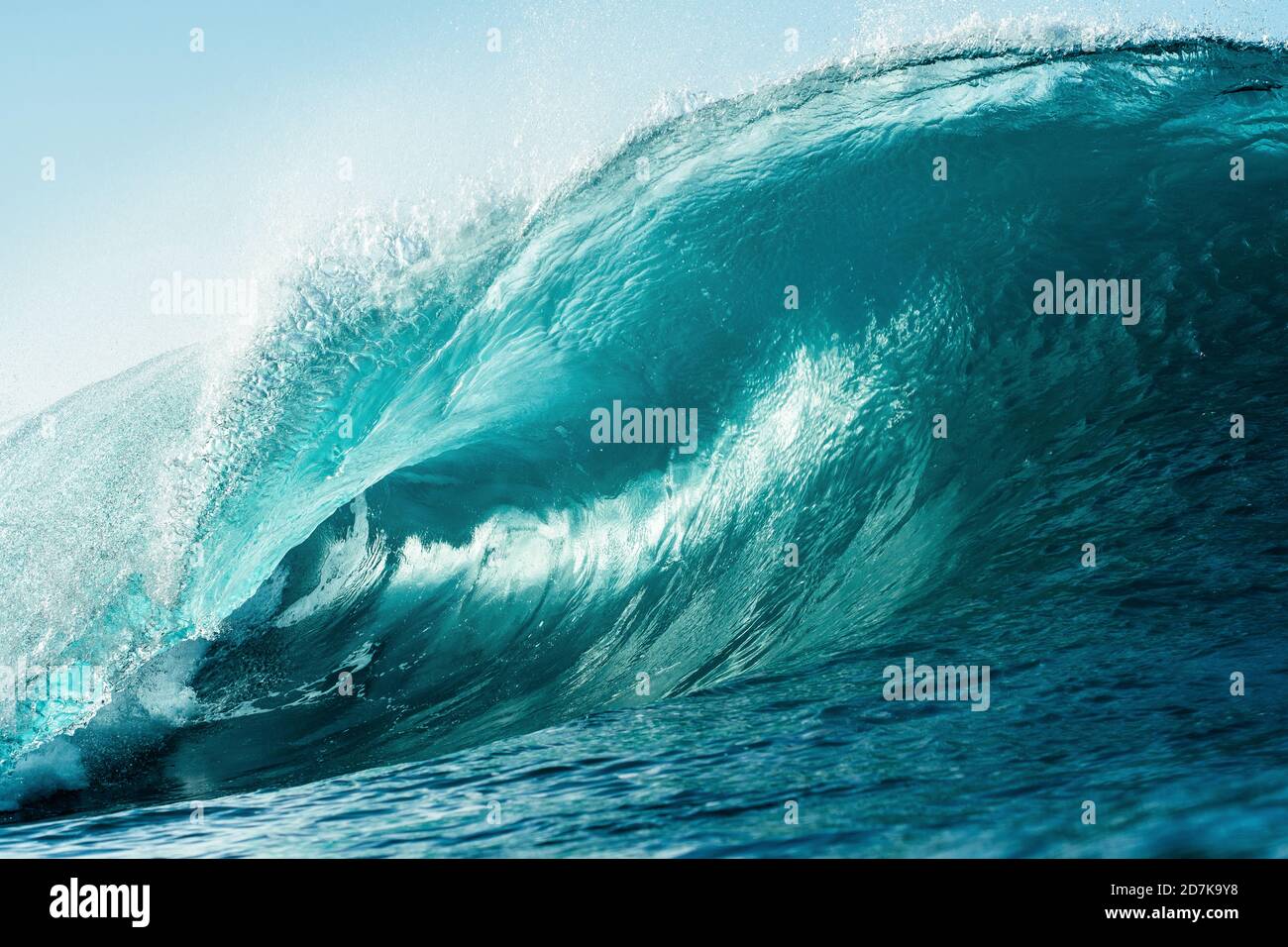 Ocean wave breaking in morning light Stock Photo - Alamy
