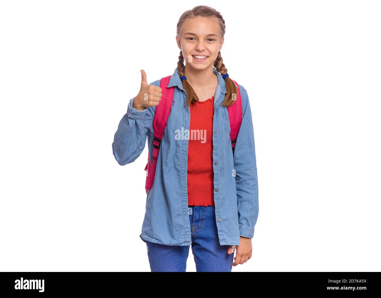 Happy teenage girl pointing up, gesturing idea or doing number one ...