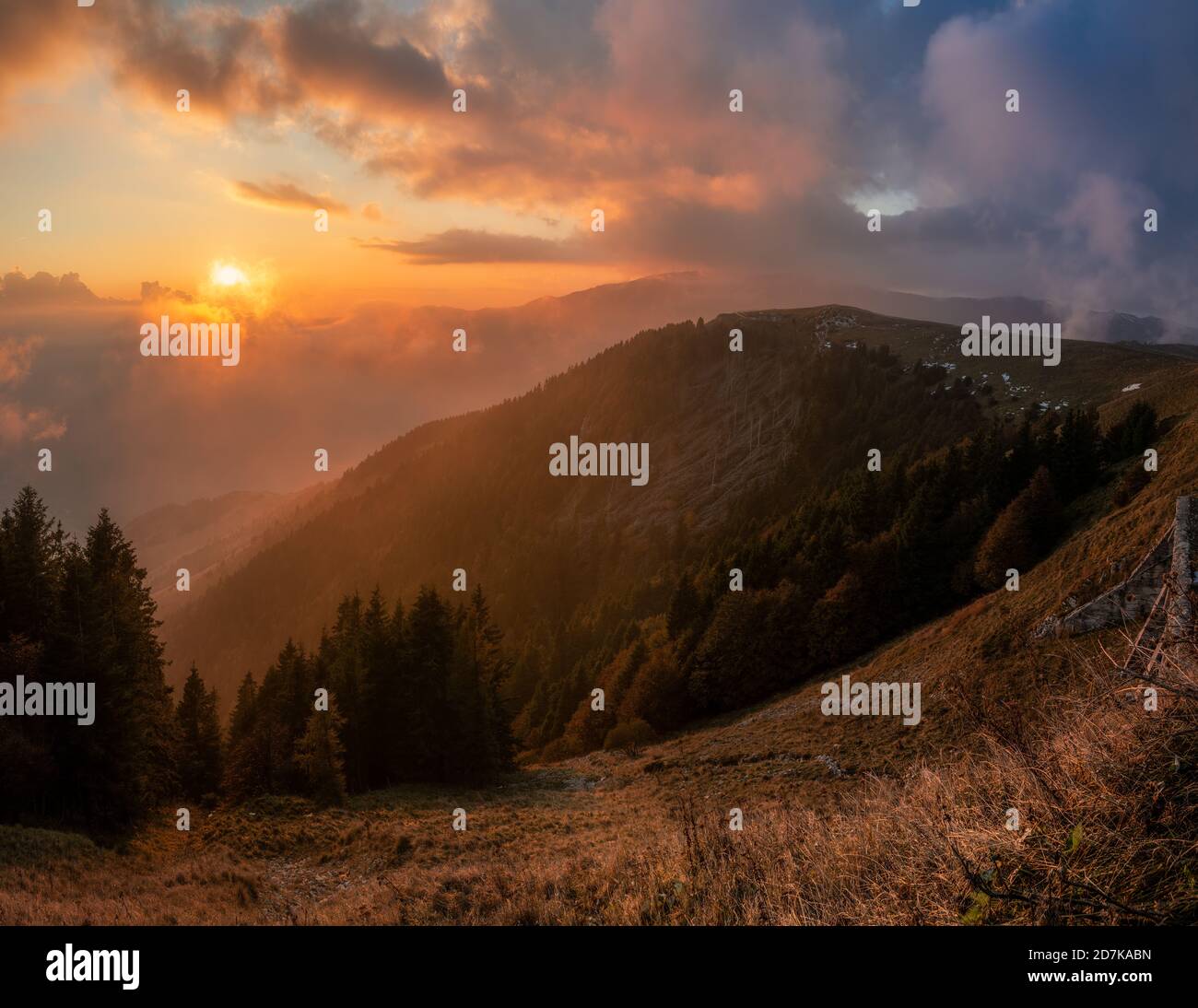 Cloudy autumn sunset on the mount Pizzoc, Veneto region Stock Photo - Alamy