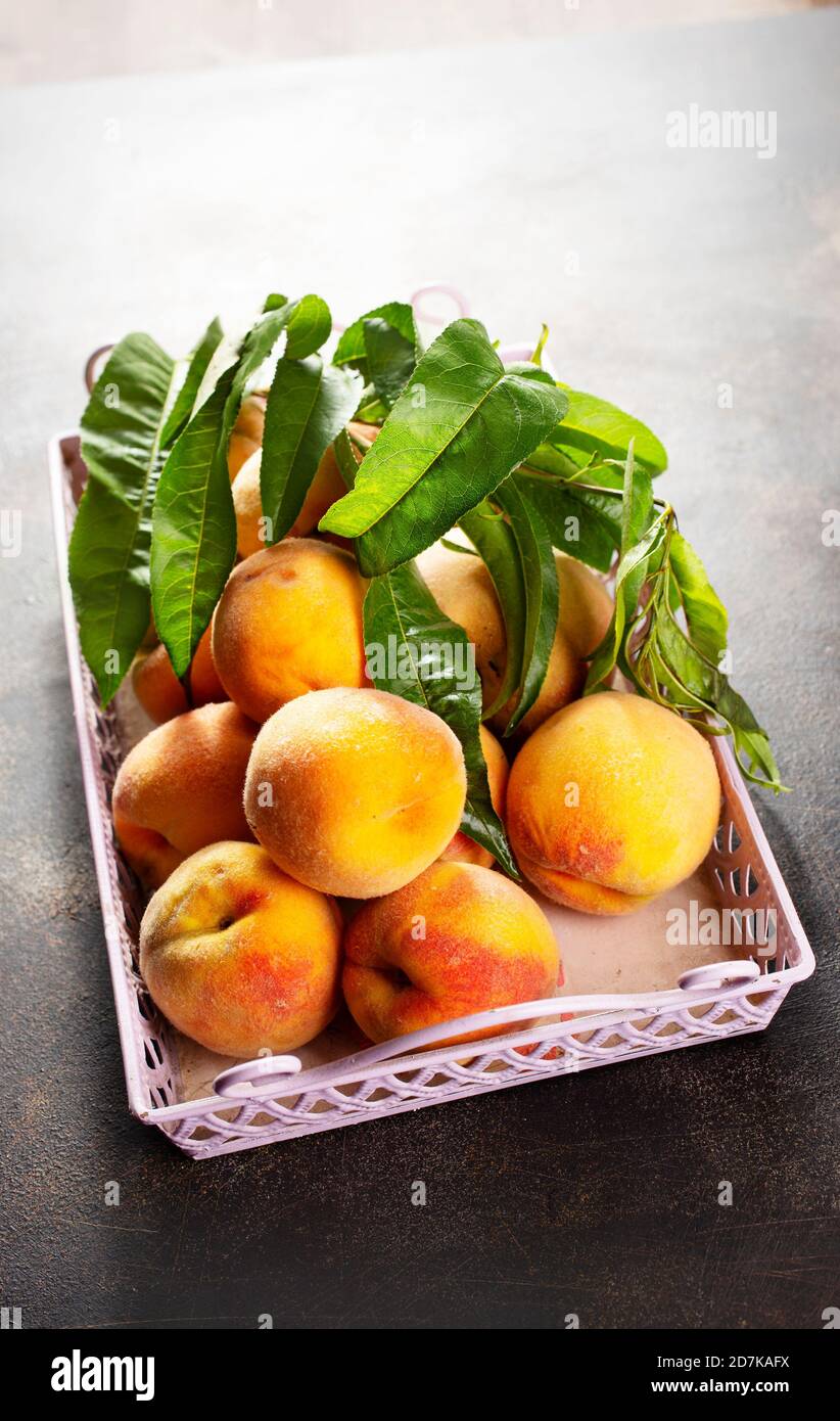 Peach fruit on a table, fresh fruit Stock Photo - Alamy