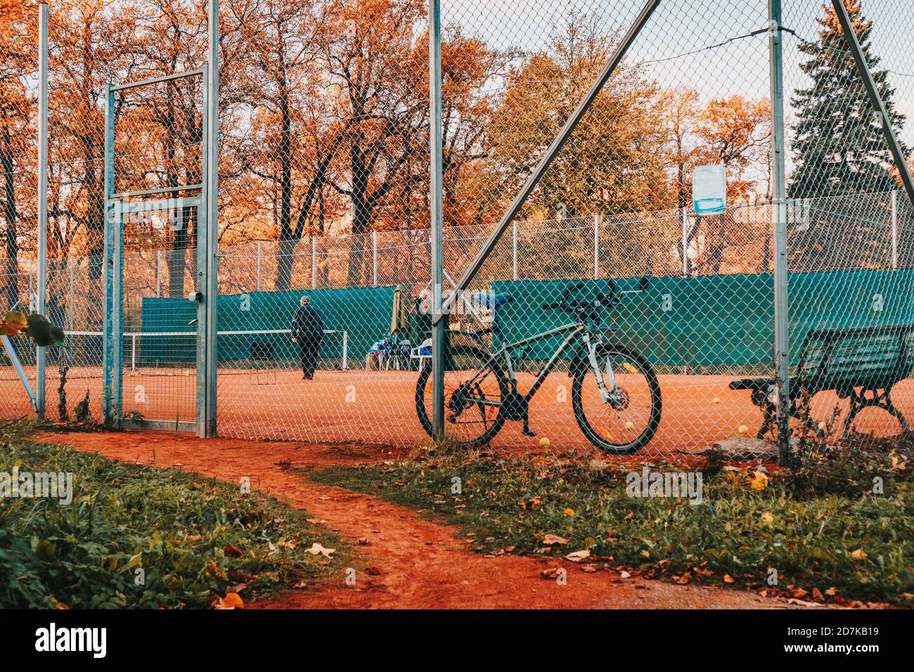 Mature man player in tennis court active lifestyle bike art filter ...