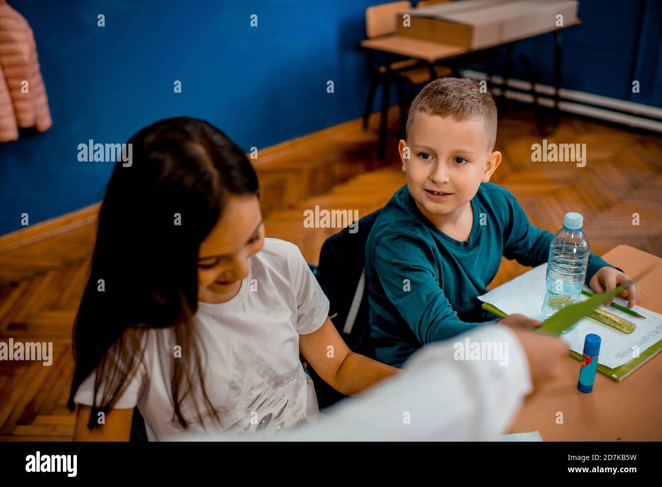 Creative kids making some paper arts and crafts Stock Photo - Alamy