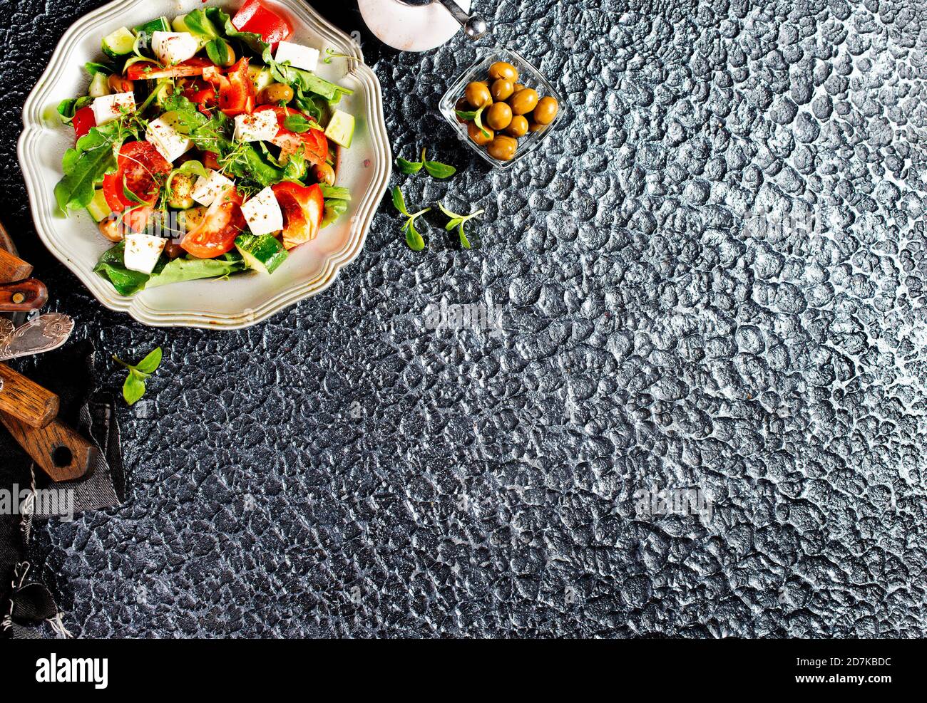 greek salad on metal plate, salad with feta cheese Stock Photo - Alamy