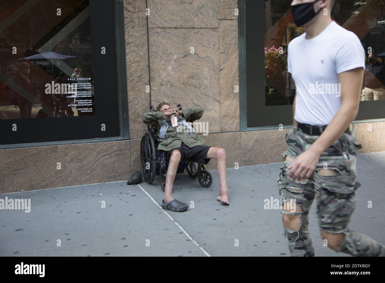 Homeless man on wheelchair hi-res stock photography and images - Alamy