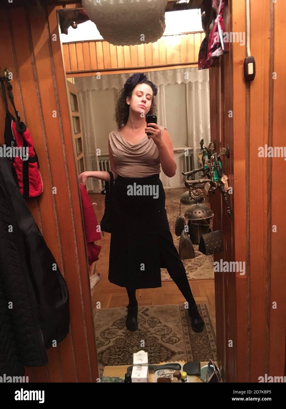 Young woman makes a selfie self portrait at home in the mirror Stock ...