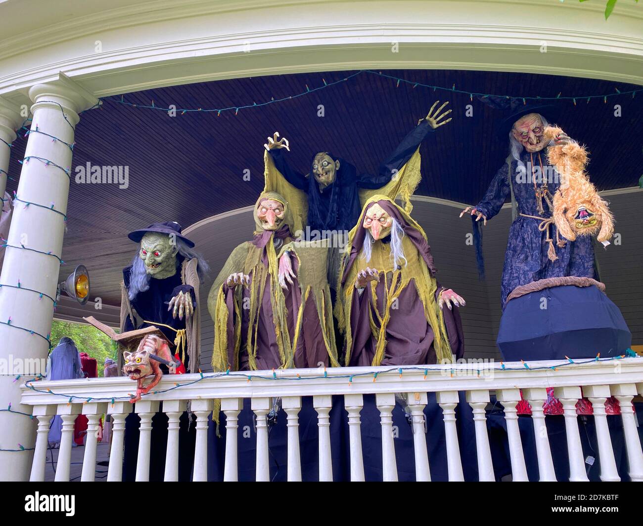 Scary Halloween installation on the porch of a large victorian house in ...