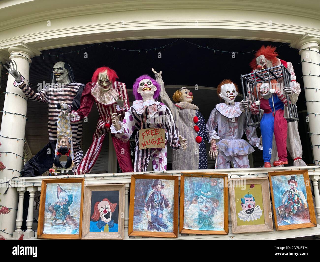 Scary Halloween installation on the porch of a large victorian house in ...