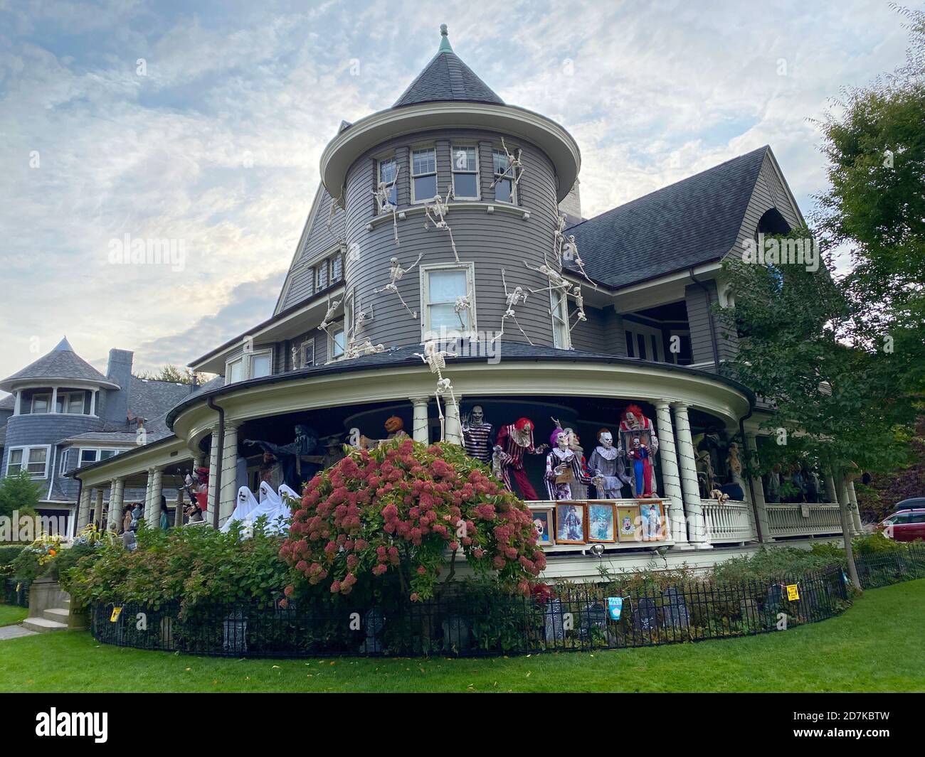 Scary Halloween installation on the porch of a large victorian house in ...