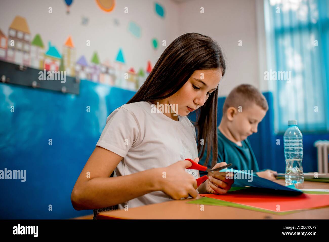Creative kids making some paper arts and crafts Stock Photo - Alamy