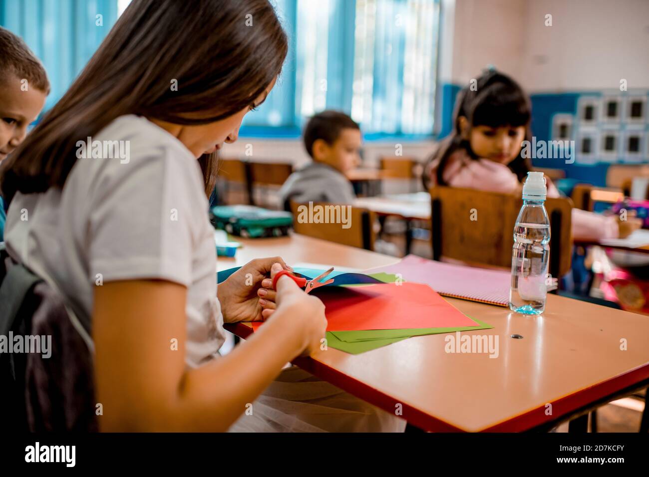 Creative kids making some paper arts and crafts Stock Photo - Alamy