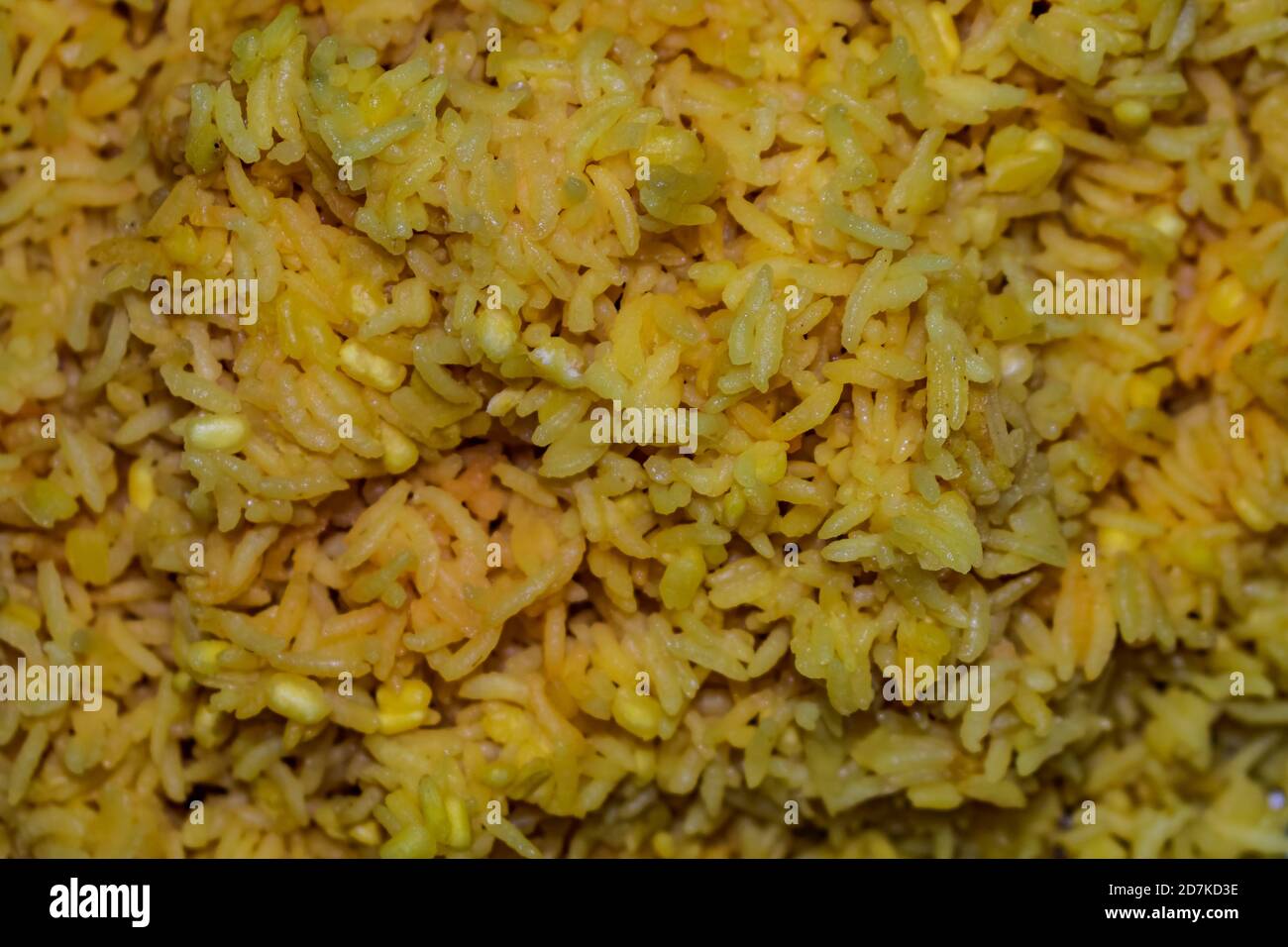 Yellow fried rice served on steel plate looking awesome Stock Photo - Alamy