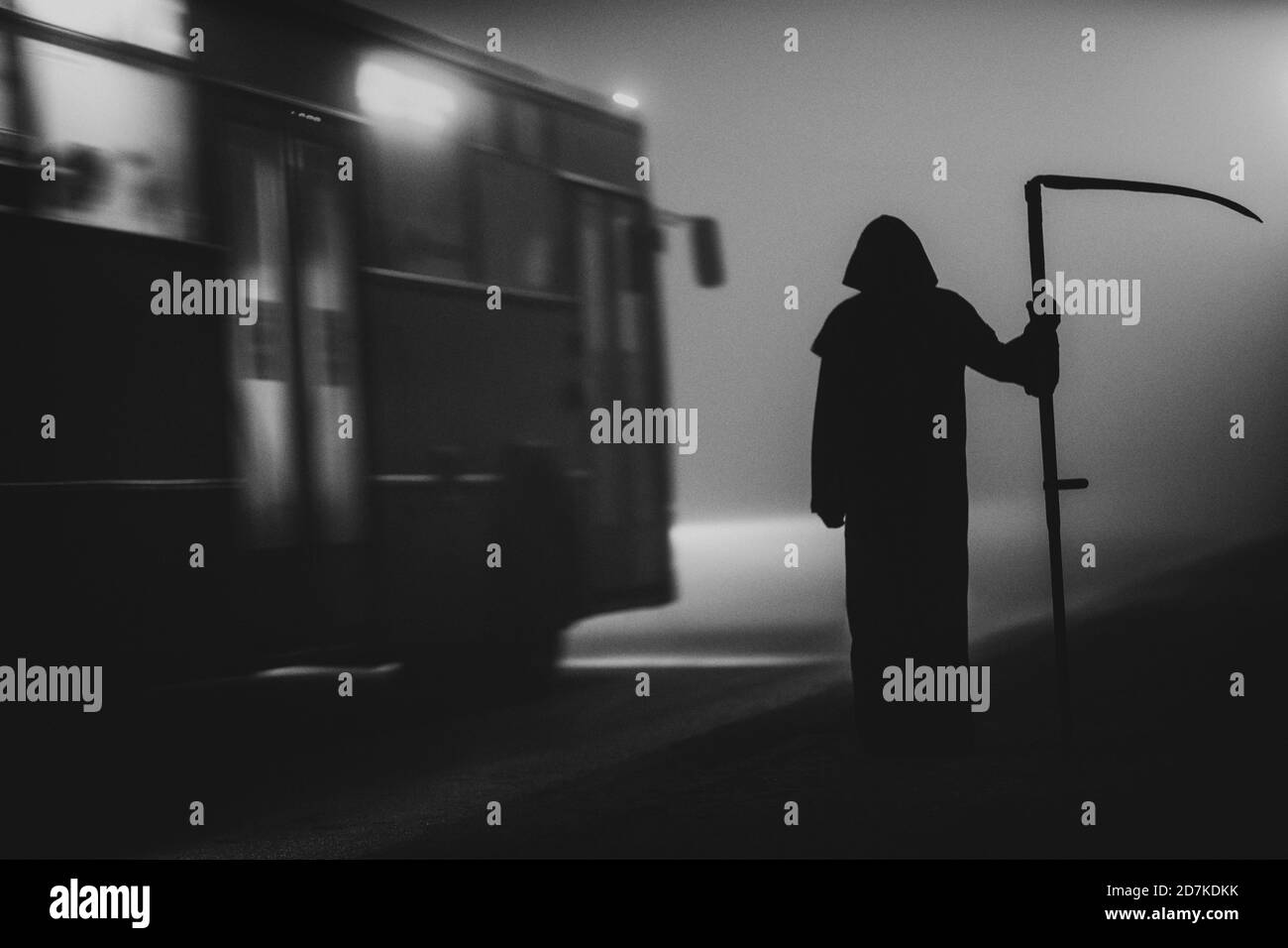 Death grim Reaper skeleton wearing a black robe and wielding a scythe ...