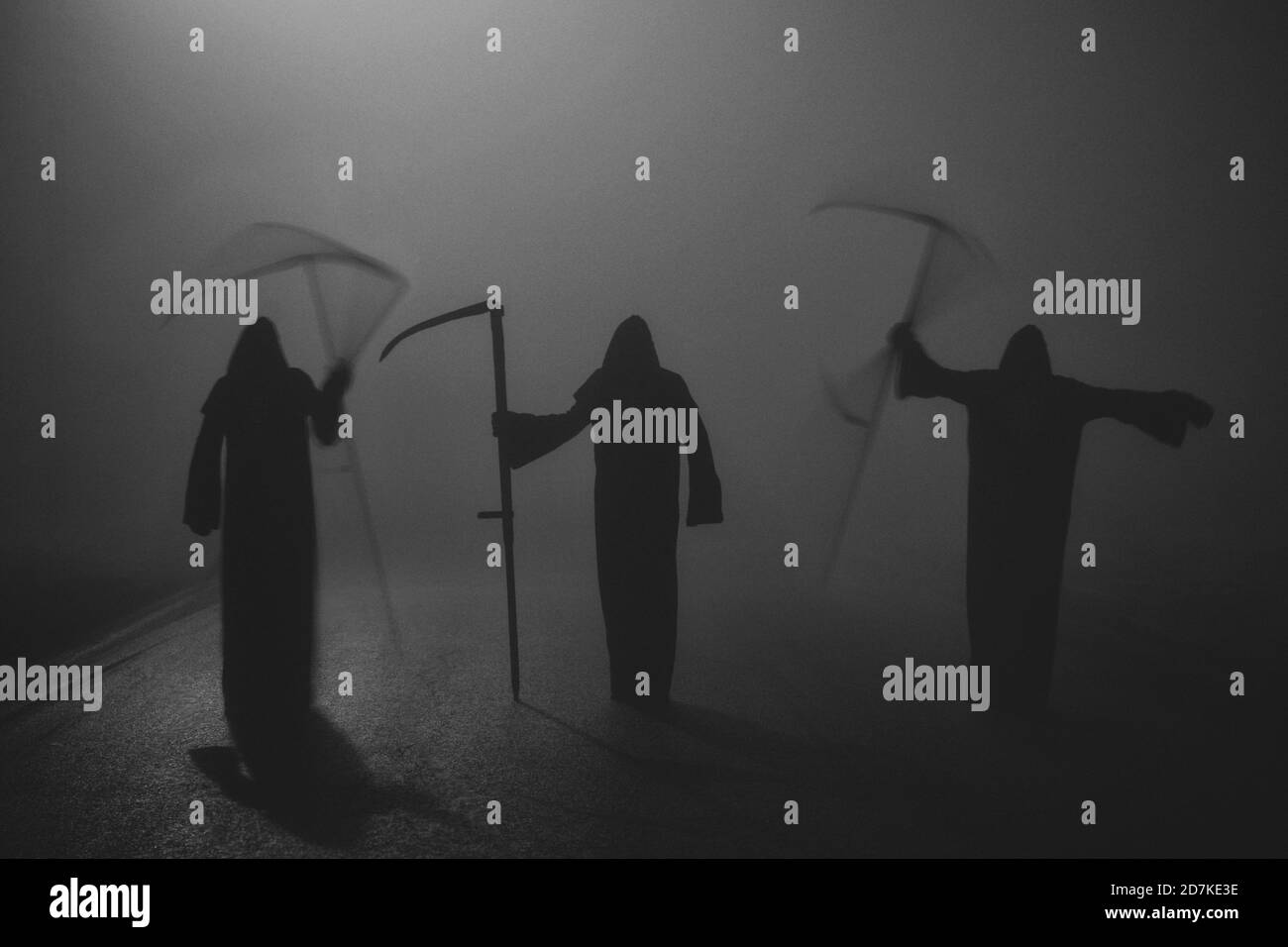 Death grim Reaper skeleton wearing a black robe and wielding a scythe ...