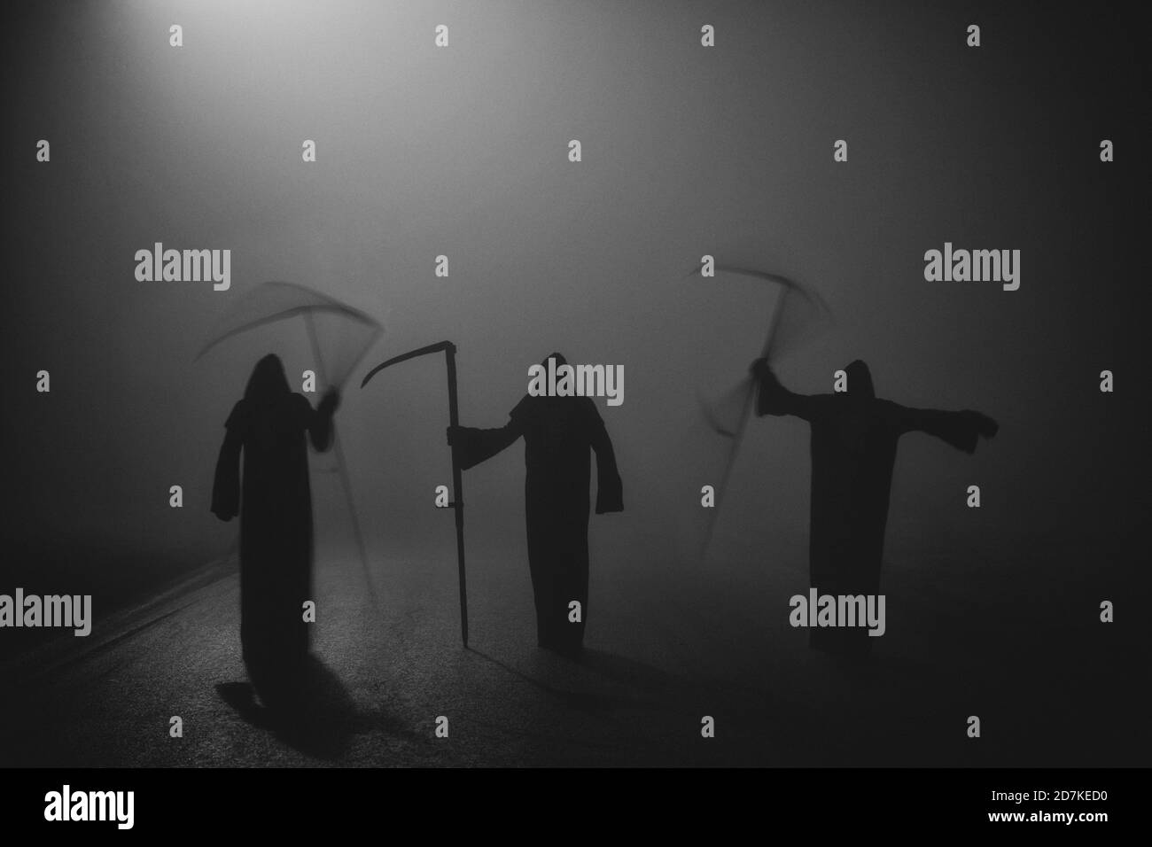 Death grim Reaper skeleton wearing a black robe and wielding a scythe ...