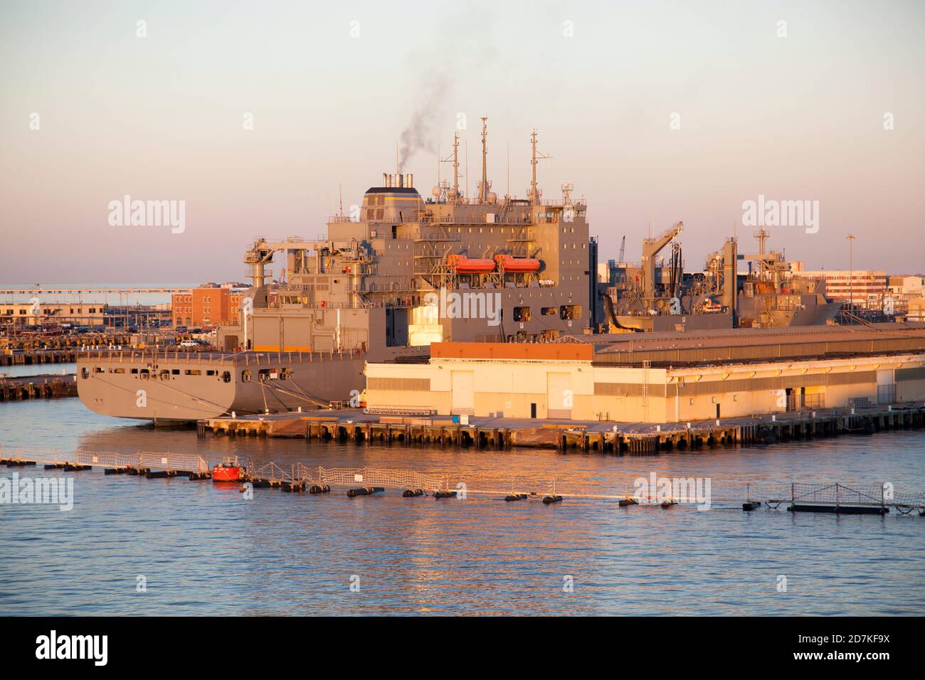 The navy ship in a sunset light in a military base outside Norfolk city ...