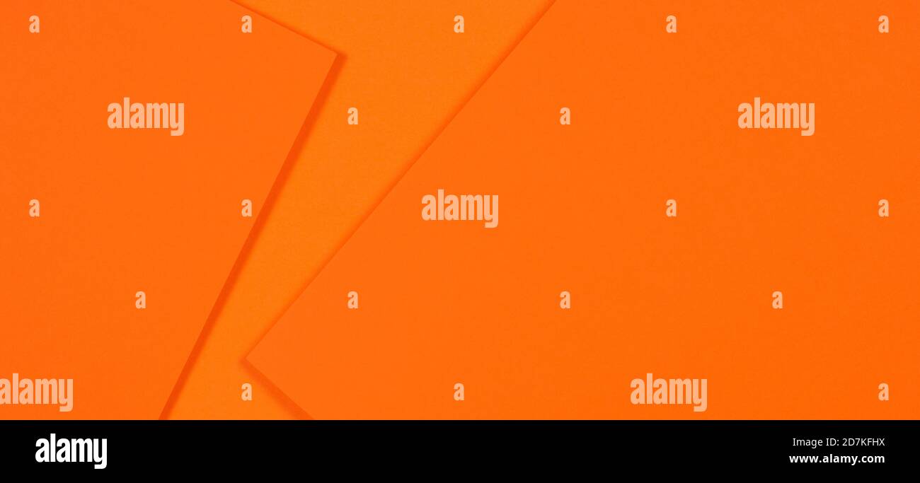 Abstract geometric shape orange color paper background Stock Photo - Alamy
