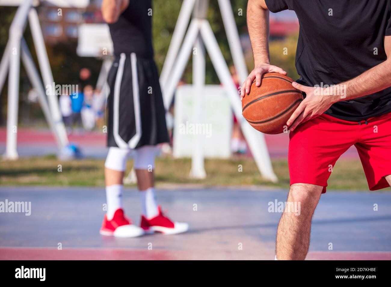 Group Of Young Friends Playing Basketball Match Stock Photo - Alamy